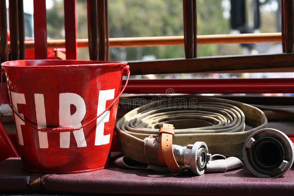 Fire engine pail and hose stock photo. Image of colors - 11845222