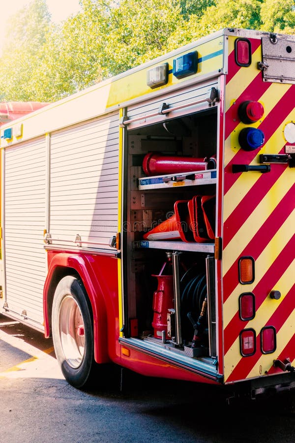 The Fire Engine is Parked Outside the Fire Department Garage Stock ...
