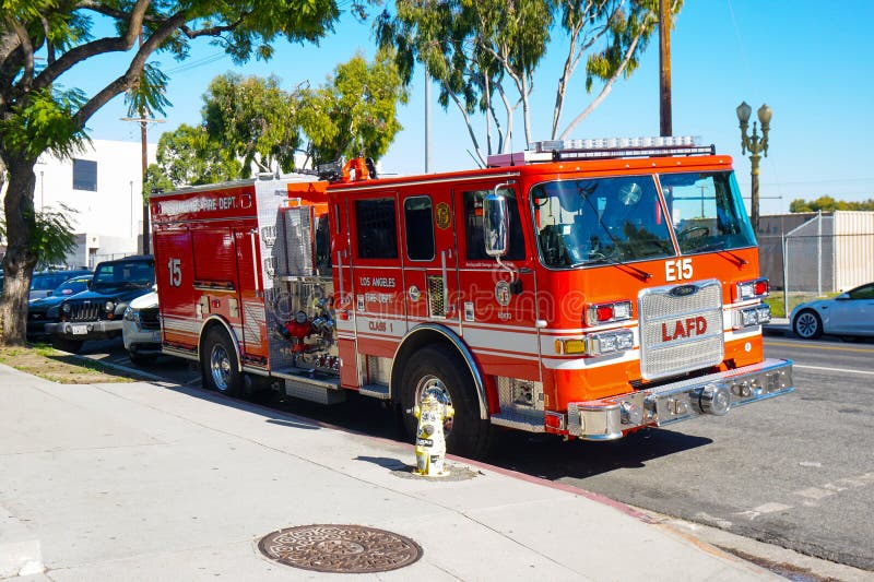 A Fire Engine Parked on the Street Next To a Fire Hydrant Editorial ...