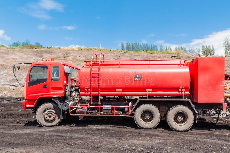 Fire Engine Or Fire Truck In Open-pit Coal Mine With Blue Sky ...