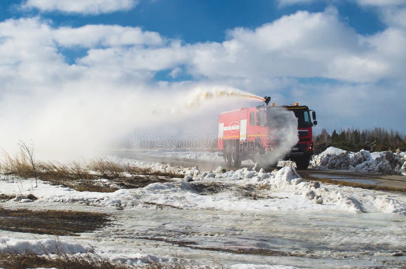 Fire Engine and Water from Fire Hoses Demonstration. Stock Image ...