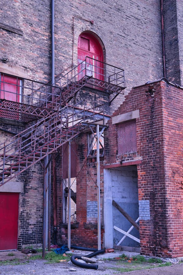 Fire Escape on an Abandoned Brick Building Stock Photo - Image of retro, evacuation: 375676284