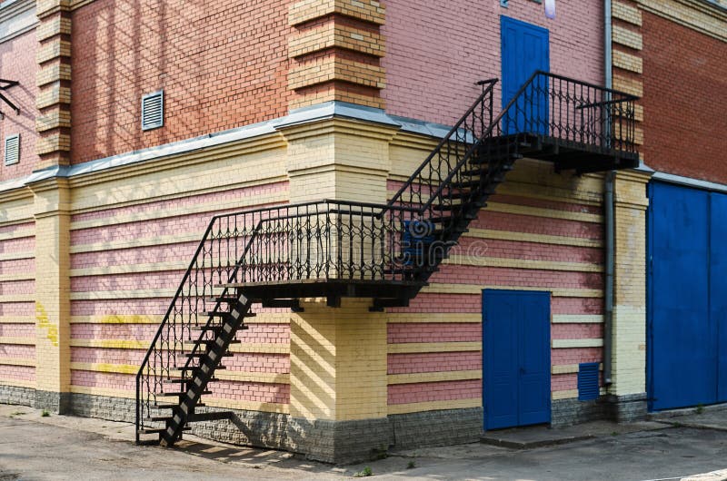 Fire Escape at the Corner of a Brick Transformer Box Stock Photo ...