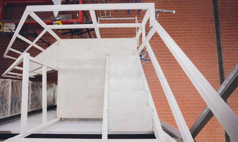 Fire Escape Ladder or Emergency Exit with Steel Staircase on Wall of ...