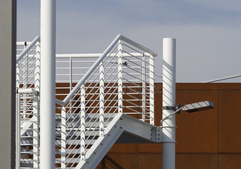 Fire Escape Ladder or Emergency Exit with Steel Staircase on Wall of ...