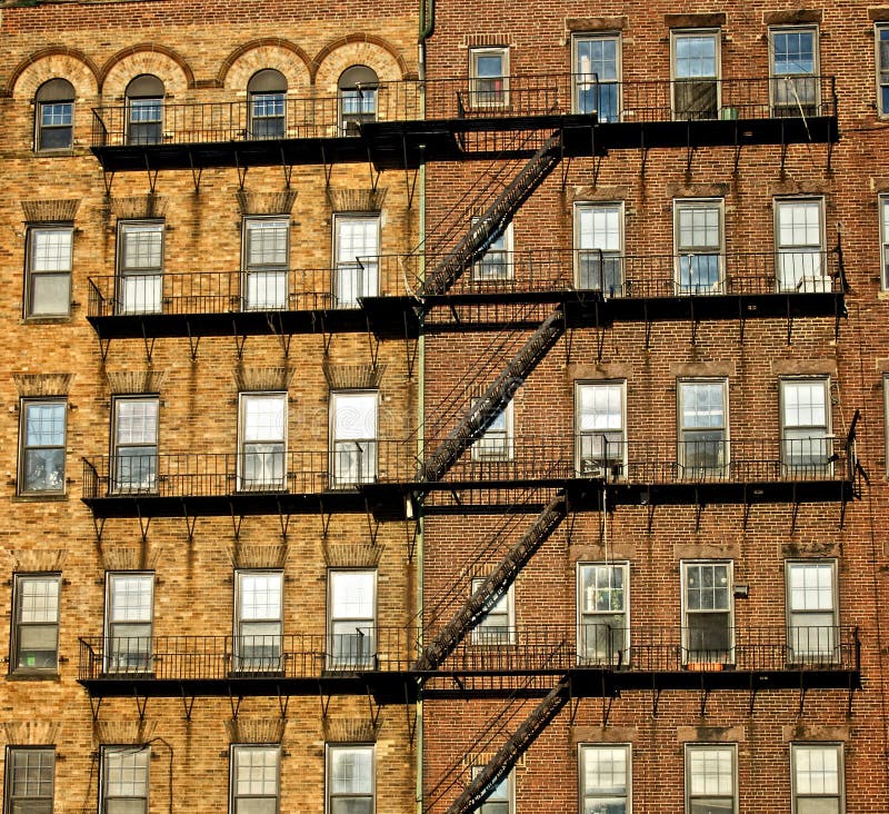 Tall Building with Fire Escape and Bay Windows Full Color Stock Photo ...