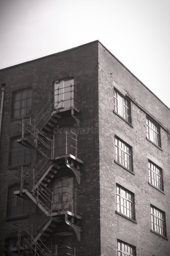 Fire escape outside a mill stock photo. Image of escape - 178826624