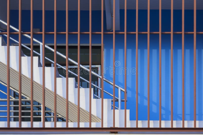 Fire Escape and Balusters Outside of Blue Facade Stock Photo - Image of ...