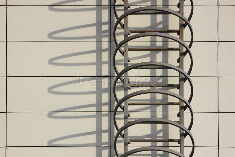 Fire Escape and Shadow on the Wall of an Office Building. Stock Photo ...