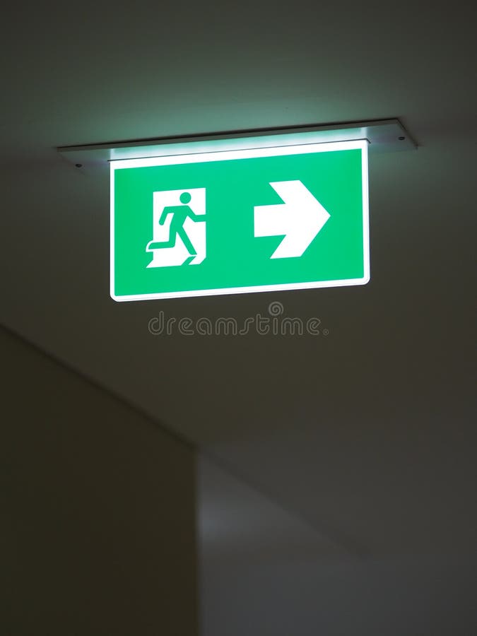 Fire Escape Sign on the Ceiling Fire Exit Arrow Symbol Stock Image ...