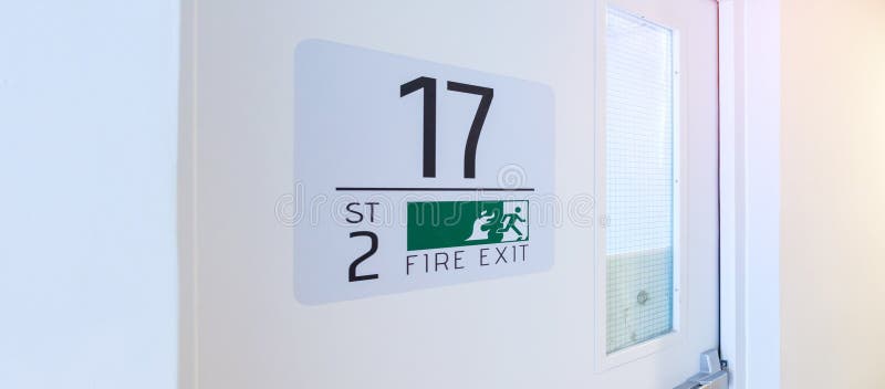 Fire Extinguisher System on the Wall with Fire Exit Door Sign for ...