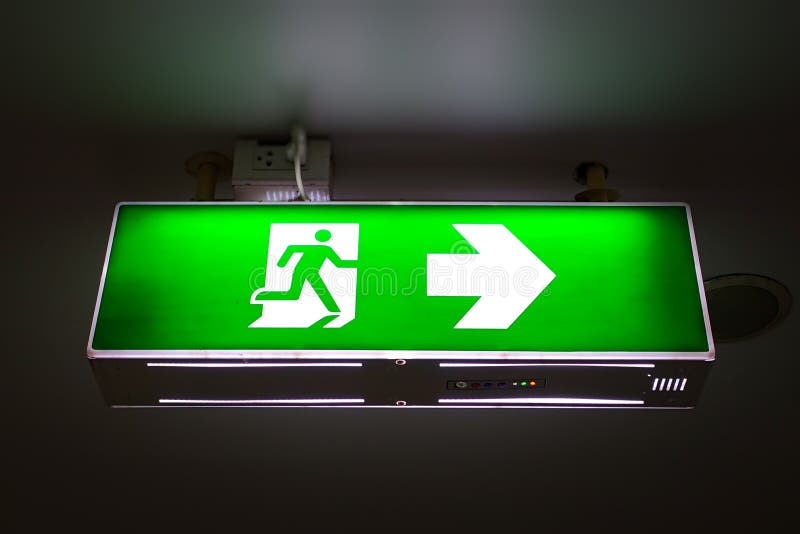Green emergency exit sign stock photo. Image of lighting - 102527210