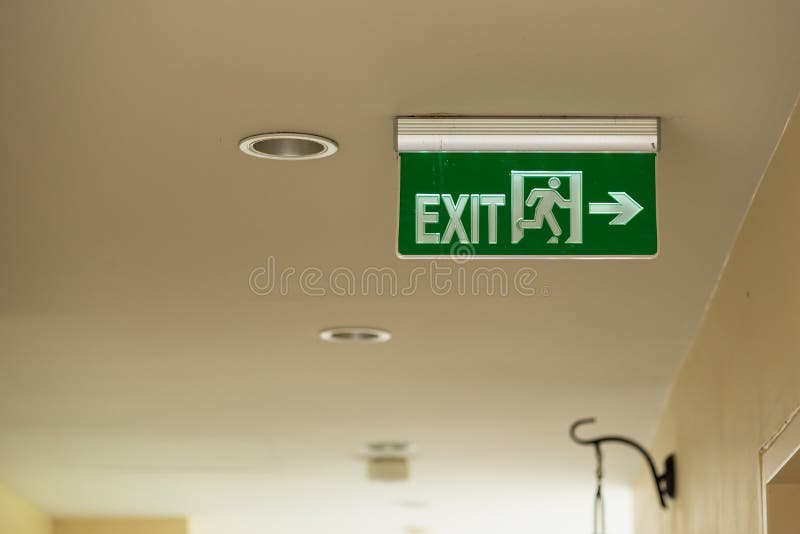 Fire Exit Light Sign in the Building. Stock Photo - Image of building ...