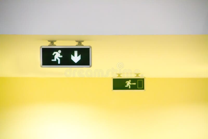 Fire exit light sign stock image. Image of runaway, building - 104552635