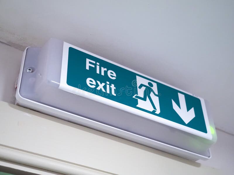 Fire exit sign stock image. Image of wooden, sign, door - 314553345
