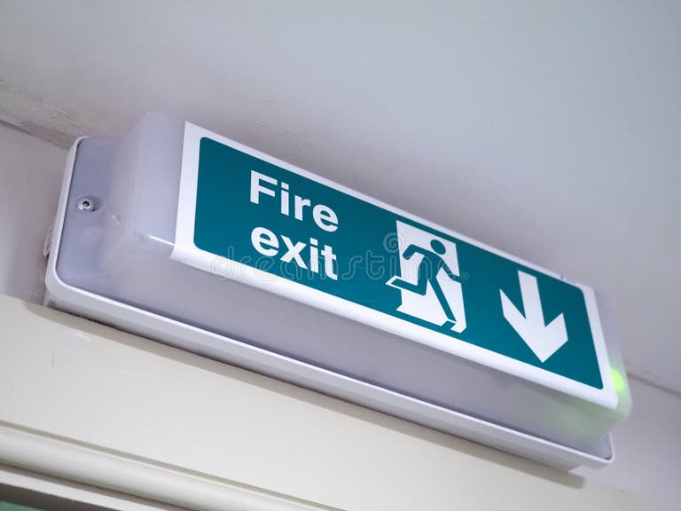 Fire exit sign stock image. Image of wooden, sign, door - 314553345