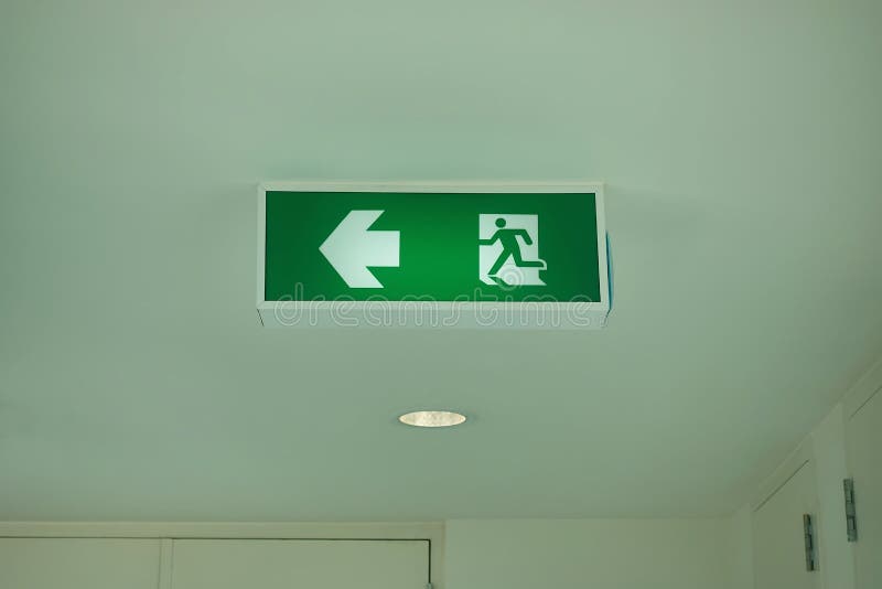 Fire Exit Sign on Ceiling in Office Stock Image - Image of indoors ...