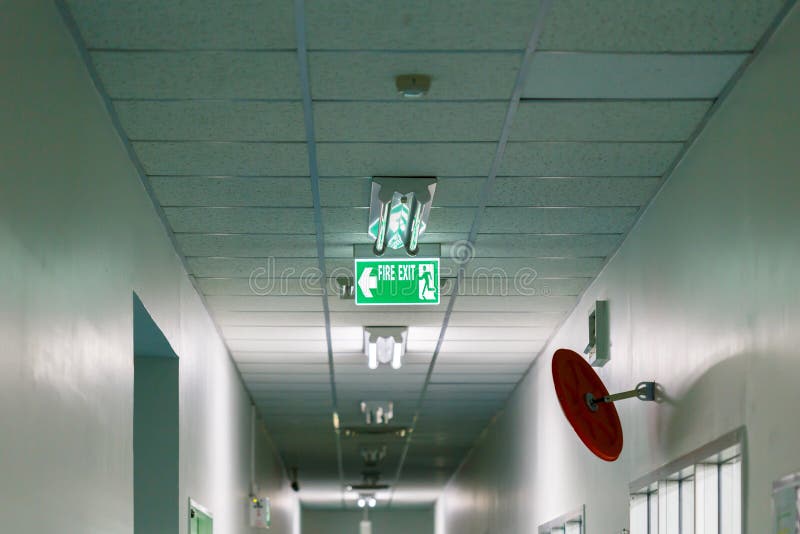 Fire exit sign in factory stock image. Image of white - 44032083