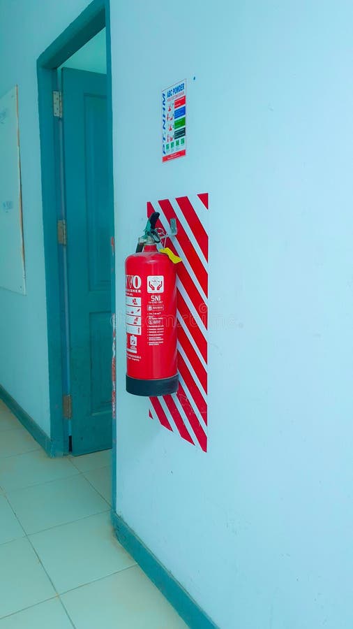Red Fire Extinguisher on the Wall. Stock Image - Image of wall, safety ...