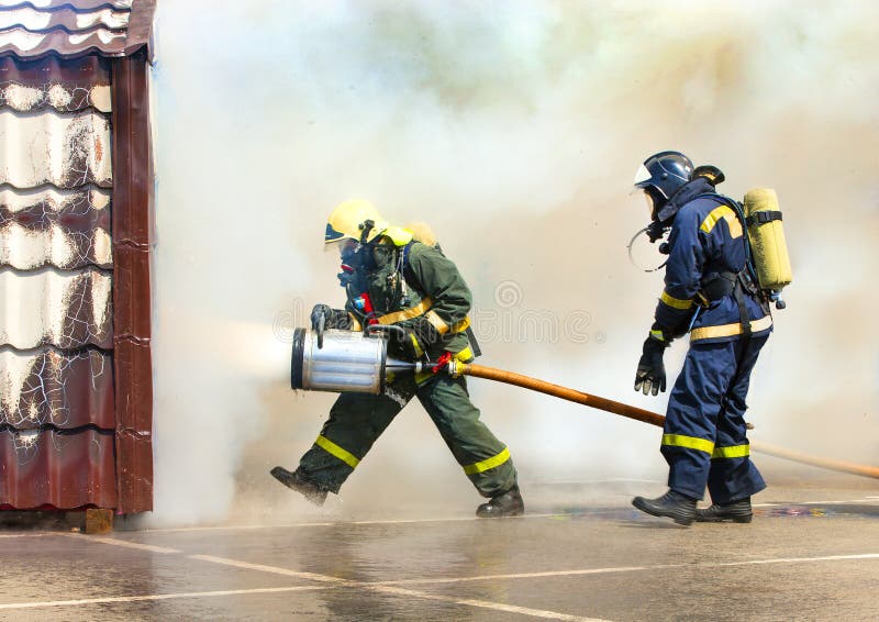 Fire Extinguish the Fire with Foam in the Smoke. Editorial Stock Photo ...