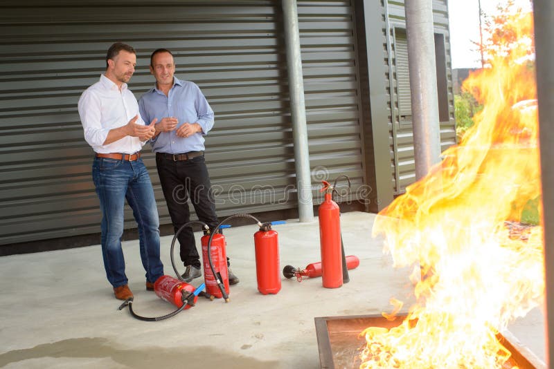 Fire and Fire Extinguisher Demonstration Stock Image - Image of product ...