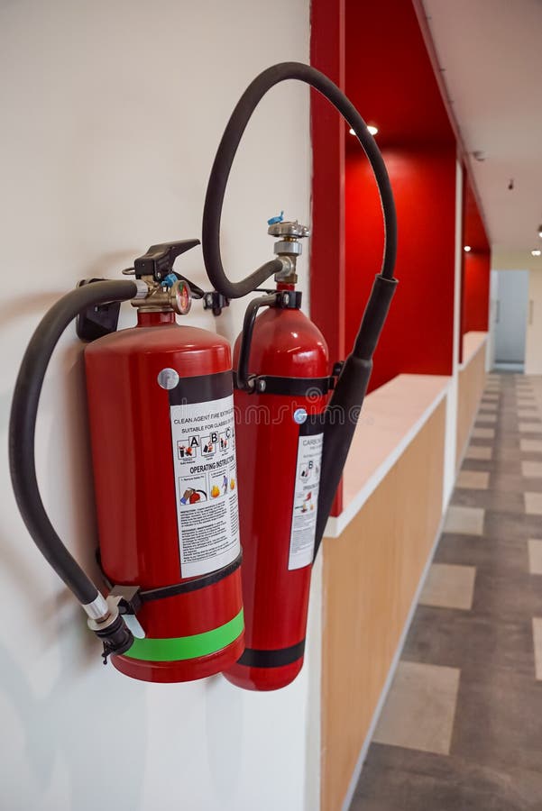 Fire Extinguisher and Gas Pump System on the Wall. Powerful Emergency ...