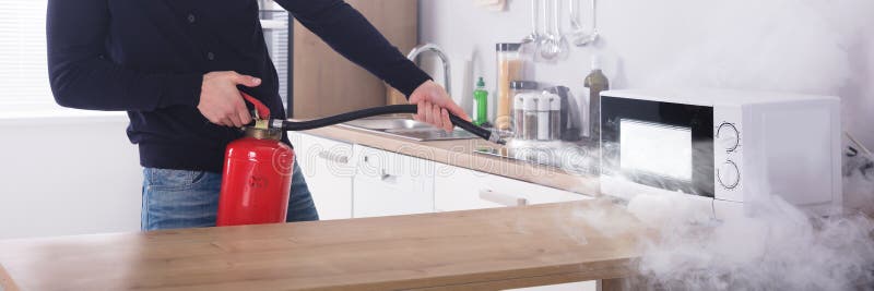 Fire Extinguisher in Kitchen Stock Photo - Image of prepare, emergency ...