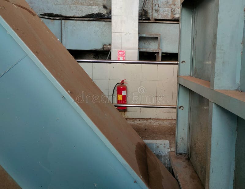 Fire Extinguisher Placed Against the Wall Stock Photo - Image of spray ...
