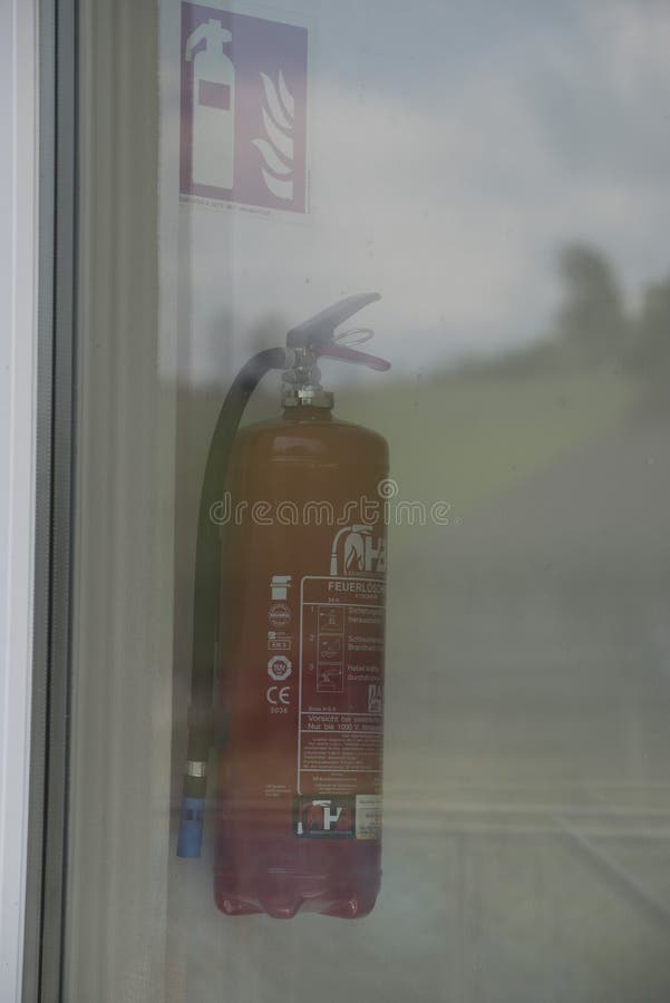 A Fire Extinguisher To Extinguish a Fire Editorial Stock Image - Image ...