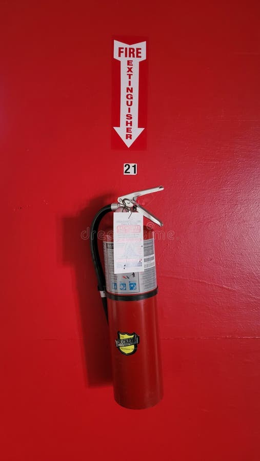Fire Extinguisher on the Wall Stock Image - Image of gadget, signage ...