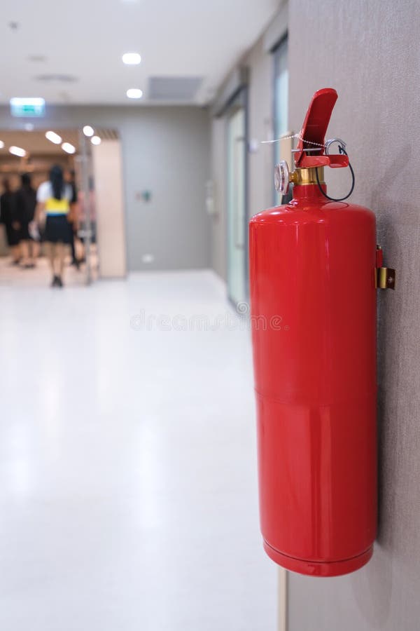 Fire Extinguisher on Wall in Front of Room at Building Stock Photo ...