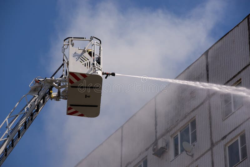 Fire Extinguishing from Fire Tower with Hydrant Stock Photo - Image of ...