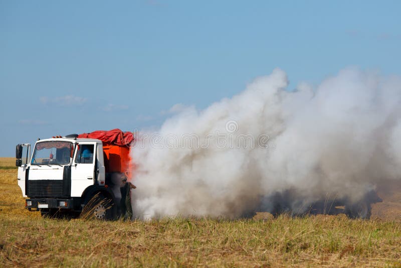 Fire Extinguishing at Harvesting in the Field Stock Image - Image of ...
