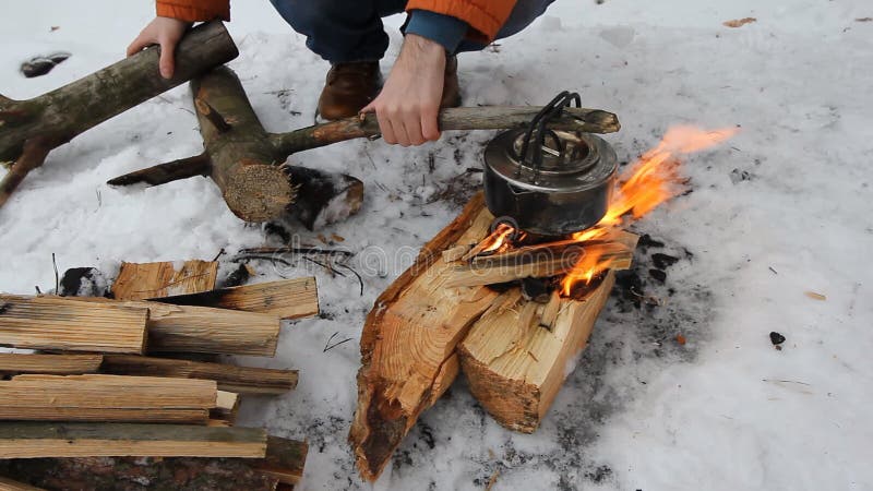 Fire in Falling Snow on Frozen Lake Stock Video - Video of broil ...