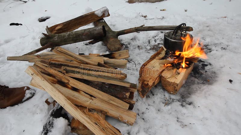 Fire in Falling Snow on Frozen Lake Stock Footage - Video of flame ...