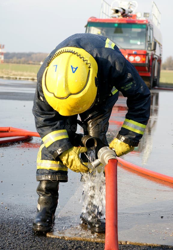 Fire Fighter Conecting Hose Editorial Stock Photo - Image of breathing ...