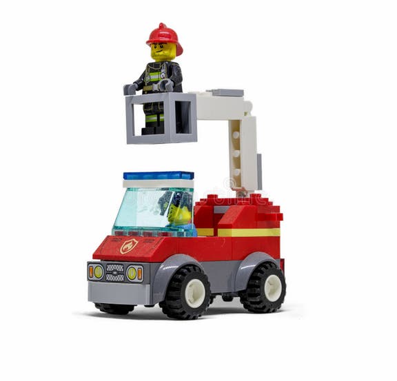 Fire Fighter in Fire Engine Brick Toy on Isolated White Background ...