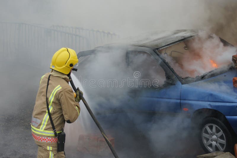 Fire fighter, car fire editorial stock image. Image of landscape ...