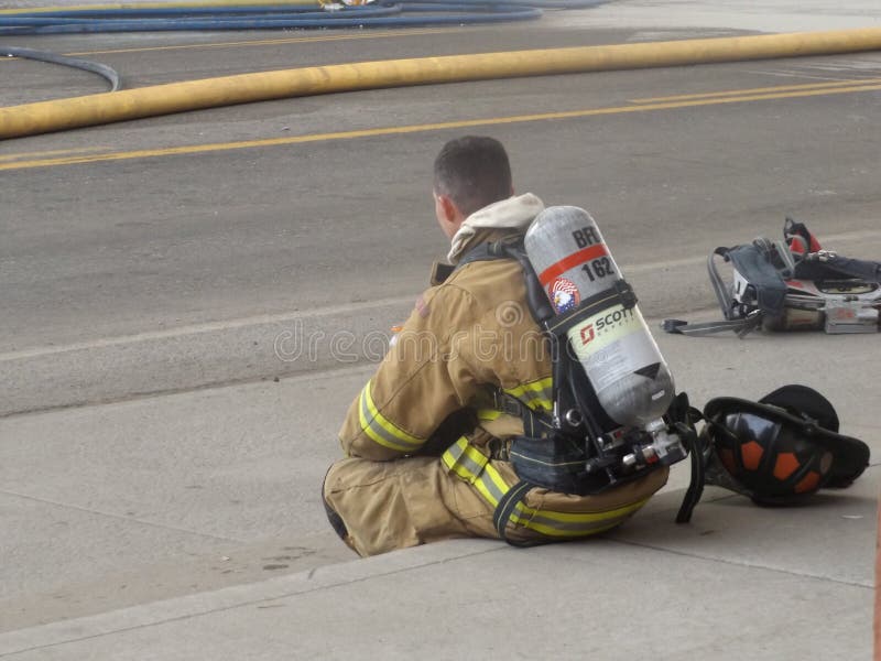 Fire Fighter Sitting this One Out Editorial Stock Photo - Image of ...