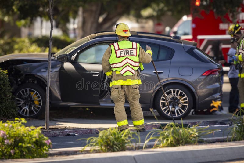A Fire Fighter Standing at a Car Accident Scene Editorial Stock Photo ...