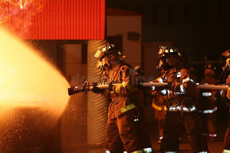 Firefighter Teamwork stock image. Image of apparatus - 18261547