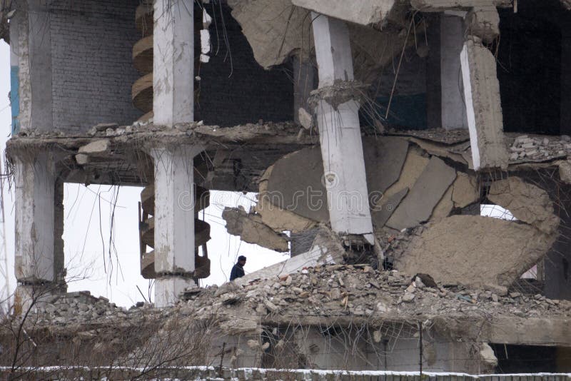 Fire Fighters Doing Rescue Work Over the Burned Building Rubbles ...