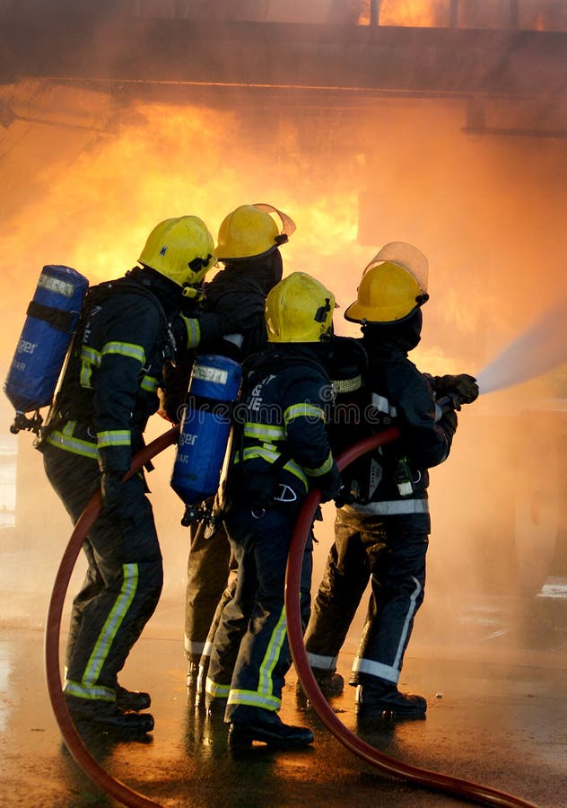 Fire Fighters Fighting Fire Editorial Photo - Image of flame, fireman ...
