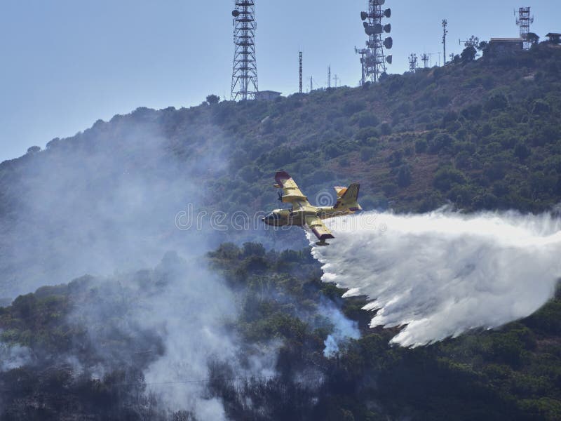 Fire fighters in the sky editorial photography. Image of flying - 233740047