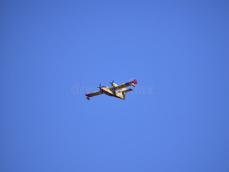 Fire fighters in the sky editorial photography. Image of firefighter ...