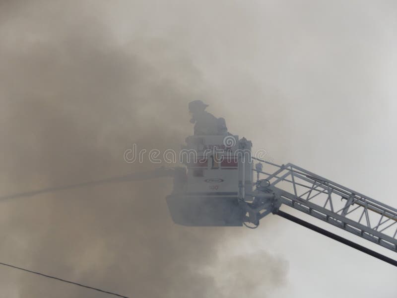 Fighting fire from above editorial photo. Image of fire - 105882446
