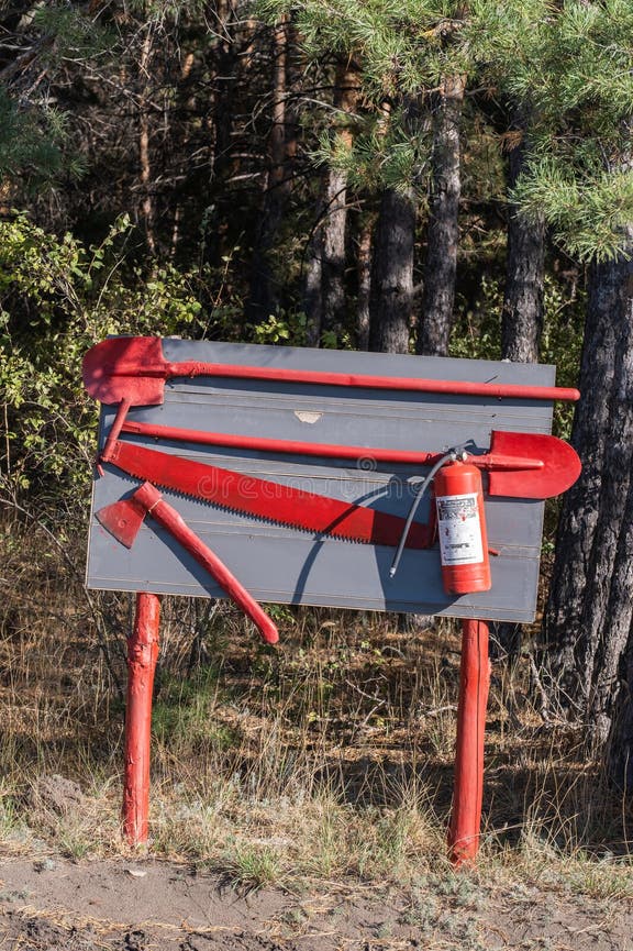 Fire Fighting Equipment in Forest on Stand is Painted Red. Stock Photo ...