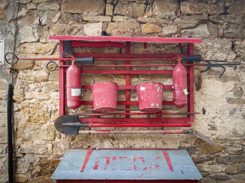 Fire-fighting Equipment on a Wall Outside Stock Photo - Image of ...
