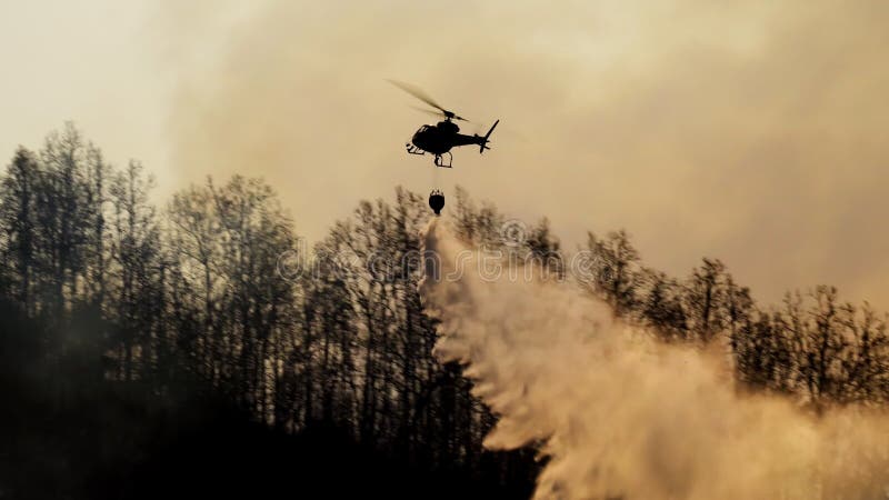 Fire Fighting Helicopter Dropping Water on Wildfire Stock Footage ...