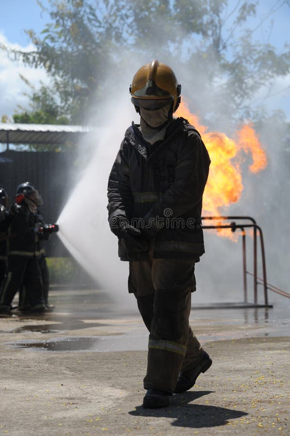 Fire fighting training. stock photo. Image of adult, protection - 43959964